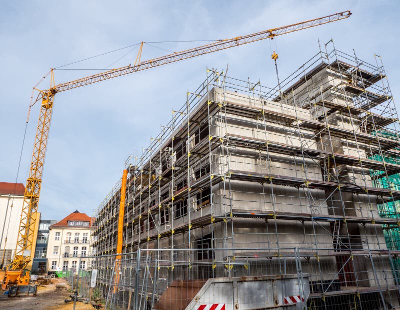 Large Construction Site with a Crane and Scaffolding at the House Stock ...