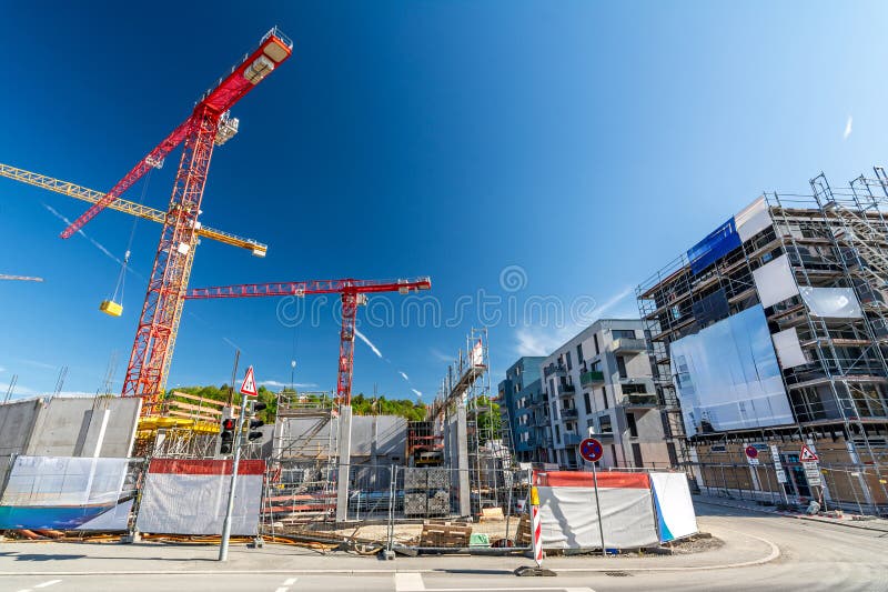 Large Construction Site with Cranes, Scaffolding and Shell of ...