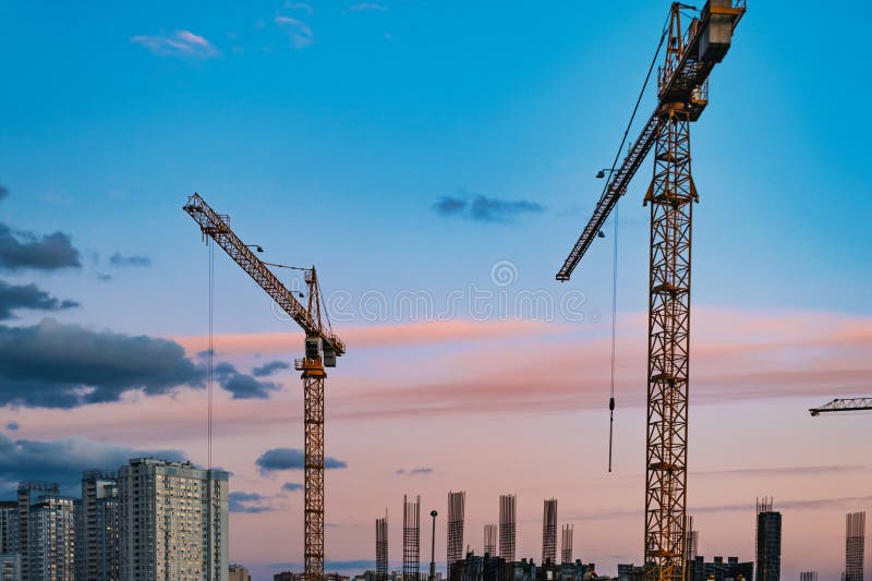 Large Construction Site with Cranes Working on a Building Complex, with ...