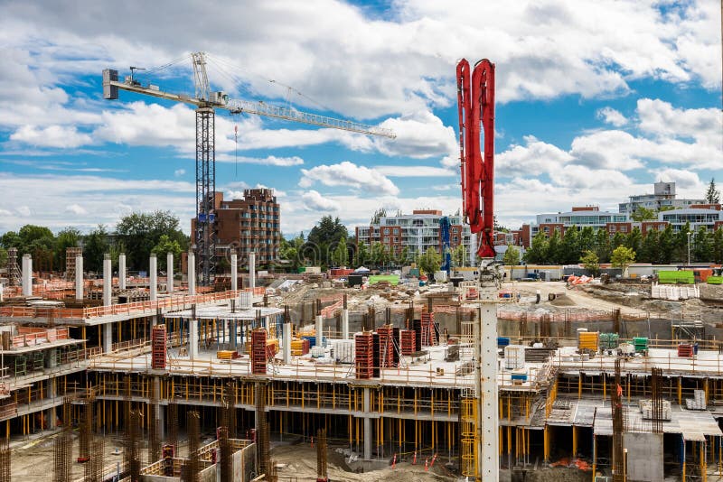 Construction Site with Cranes on the Background of Cloudy Sky Stock ...