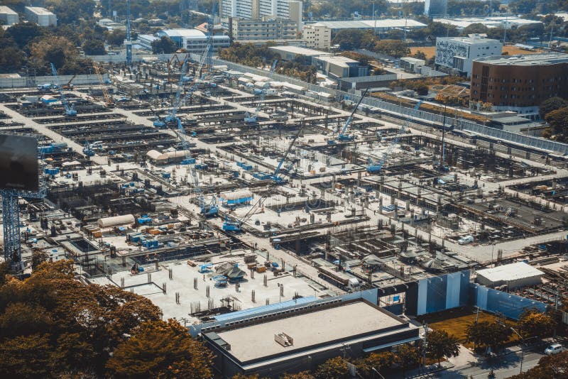 Large Construction Site with Heavy Construction Machinery in Metropolis ...