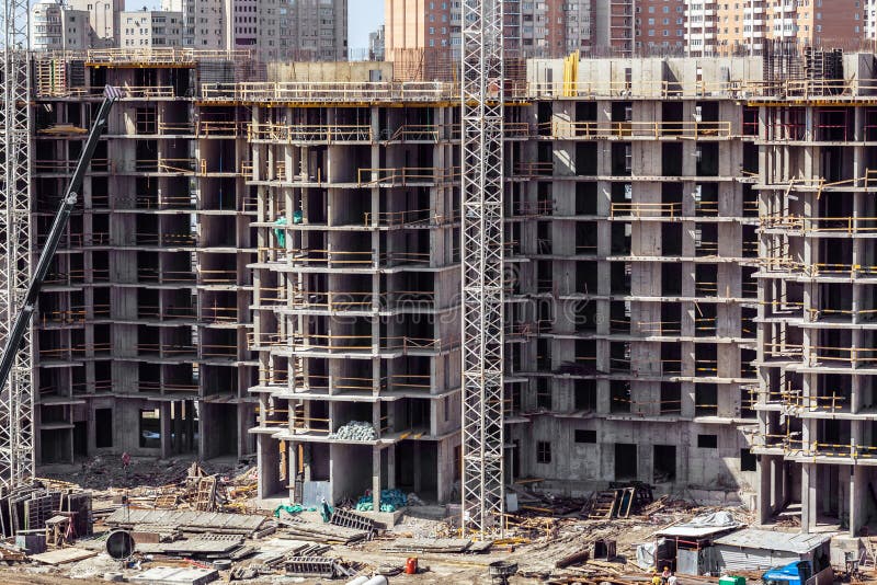 Large Construction Site Including Crane Working on a Building Complex ...