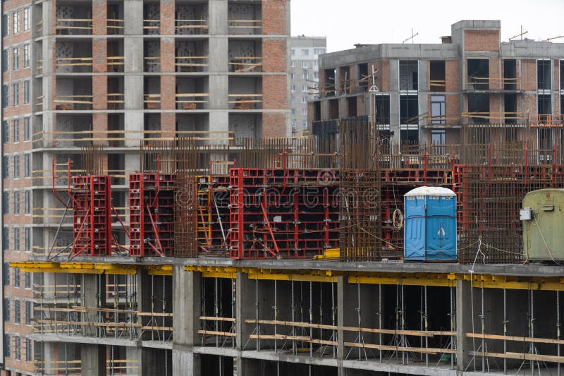Large Construction Site Including Several Cranes Working on a Building ...
