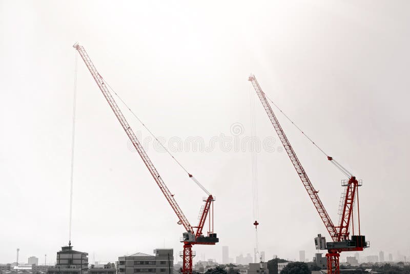 Large Construction Site Including Several Cranes Working on a Building ...