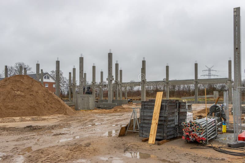 A Large Construction Site Many Concrete Columns are Placed with the ...
