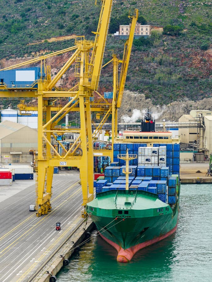 A Large Container Cargo Ship is Being Loaded at the Port S Commercial ...