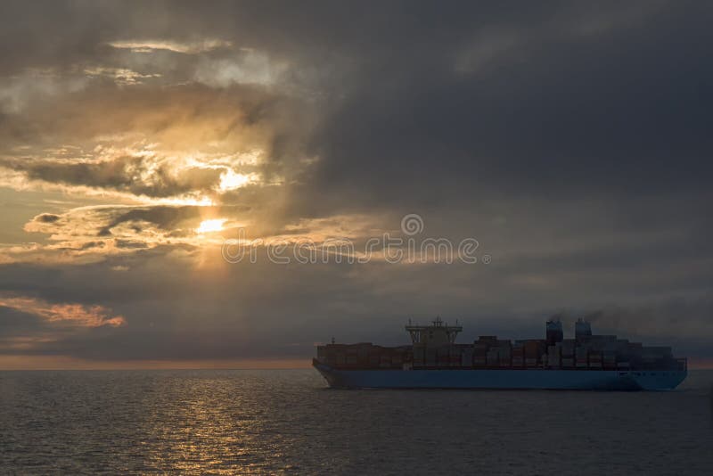 Large Container Ship on the Background of Sunset Side View Stock Photo ...