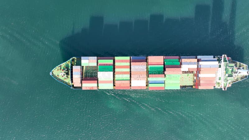 Aerial Top Down View of Tug Boats Assisting Big Cargo Ship. Stock ...