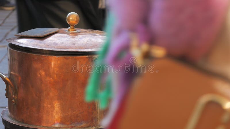 A Large Copper Pot is Steaming Outside. Chestnuts are Prepared at a ...