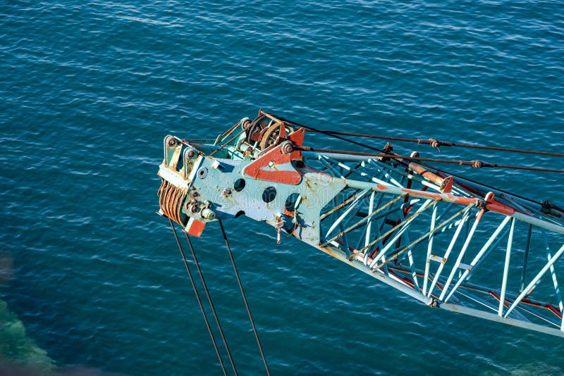 A Large Construction Crane is Positioned in the Middle of the Vast ...