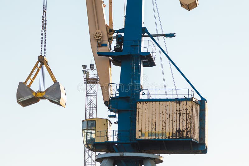 Large Crane on the Side of a Road, with Its Boom Outstretched Towards ...