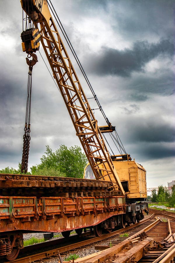 A Large Crane is Standing on Top of a Railway Track, Potentially in the ...