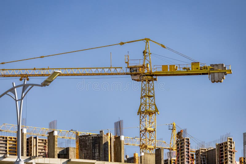 Large Cranes in Construction. an Image of a Tower Crane Against the ...