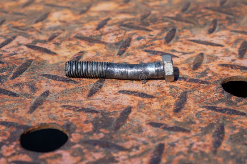 Large Crooked Bolt on Rusty Corrugated Metal Stock Image - Image of ...