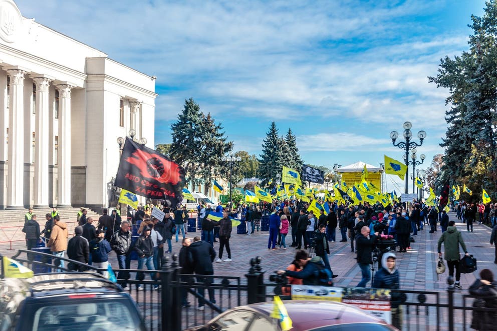 A Large Crowd of People are Protesting in Front of a Building Editorial ...