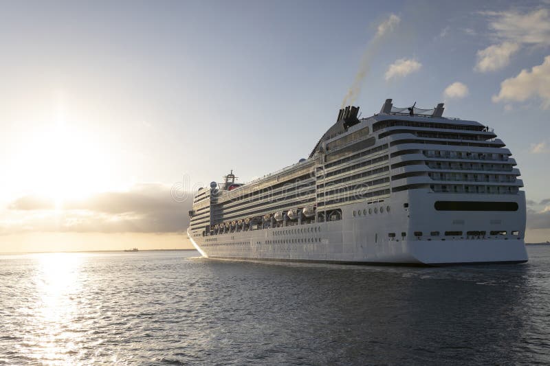 A Large Cruise Ship with the Letters MSC on the Side is Sailing in the ...