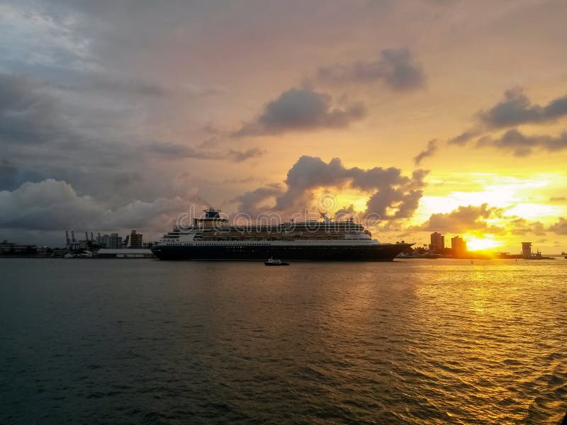 A Large Cruise Ship is Sailing in the Ocean at Sunset Stock Photo ...