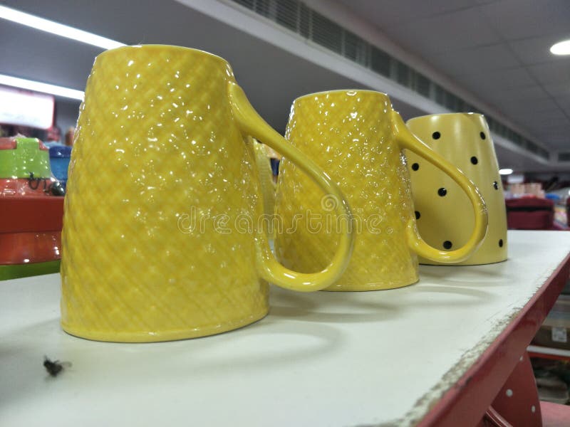 Large Cups with Yellow Color Stock Image - Image of coffee, large ...