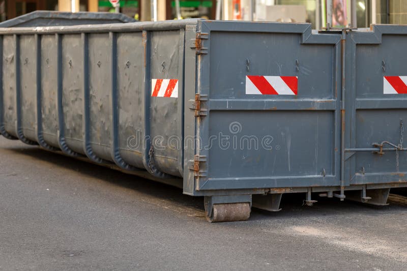 A Large Debris Container on a Road Stock Image - Image of recycling ...
