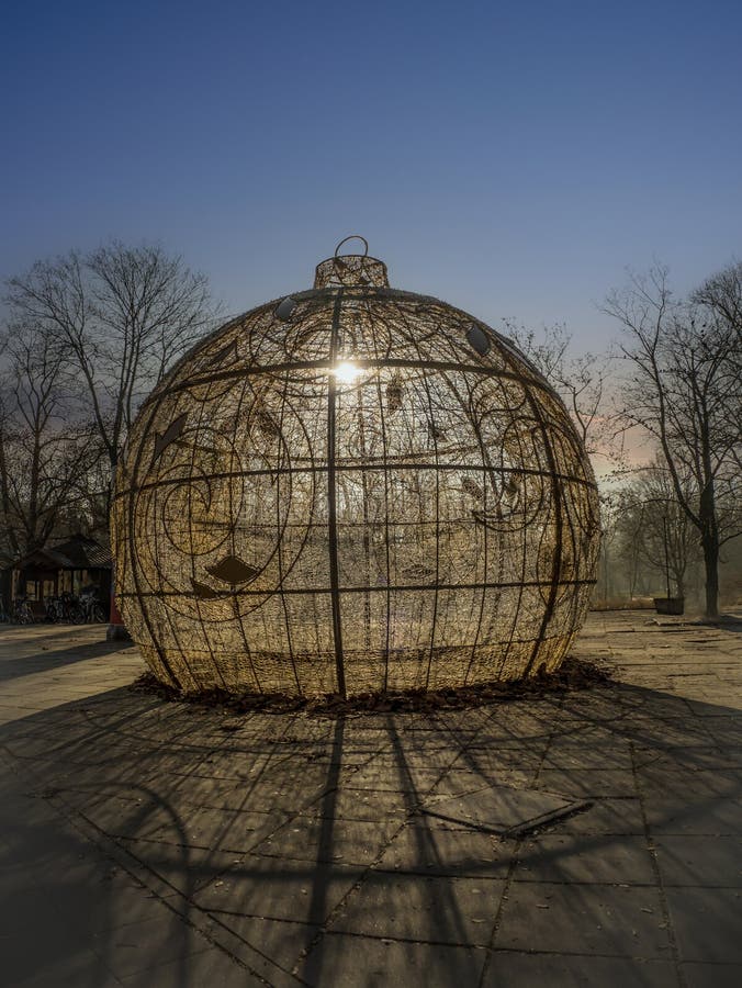 Large Decorative Christmas Ball with Intricate Patterns in a Park ...