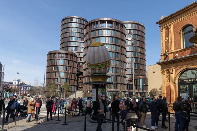 A Large Decorative Easter Egg Against a Modern Building in the City of ...