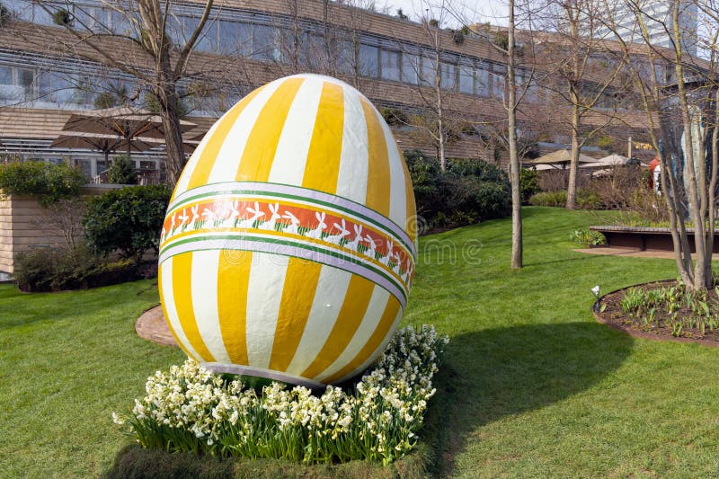 Large Decorotive Easter Egg on the Grass in the Park. Stock Image ...