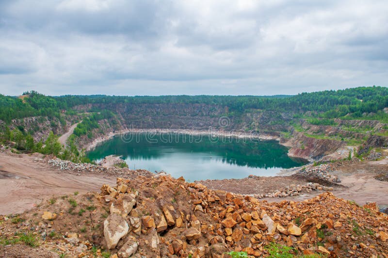 A Large Deep Pit Filled with Water, after the Extraction of the Stone ...