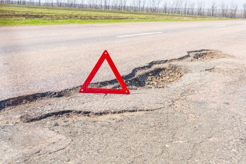 Large Deep Pothole an Example of Poor Road Stock Photo - Image of ...