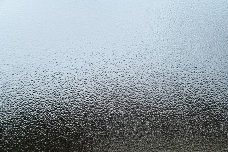 Large Dew Drops on the Window after Condensation Has Settled on the ...