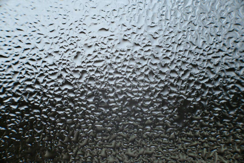 Large Dew Drops on the Window after Condensation Has Settled on the ...
