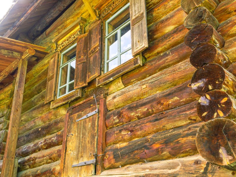 Large Diameter Logs and Windows in a Rustic Log House Built in the 19th ...
