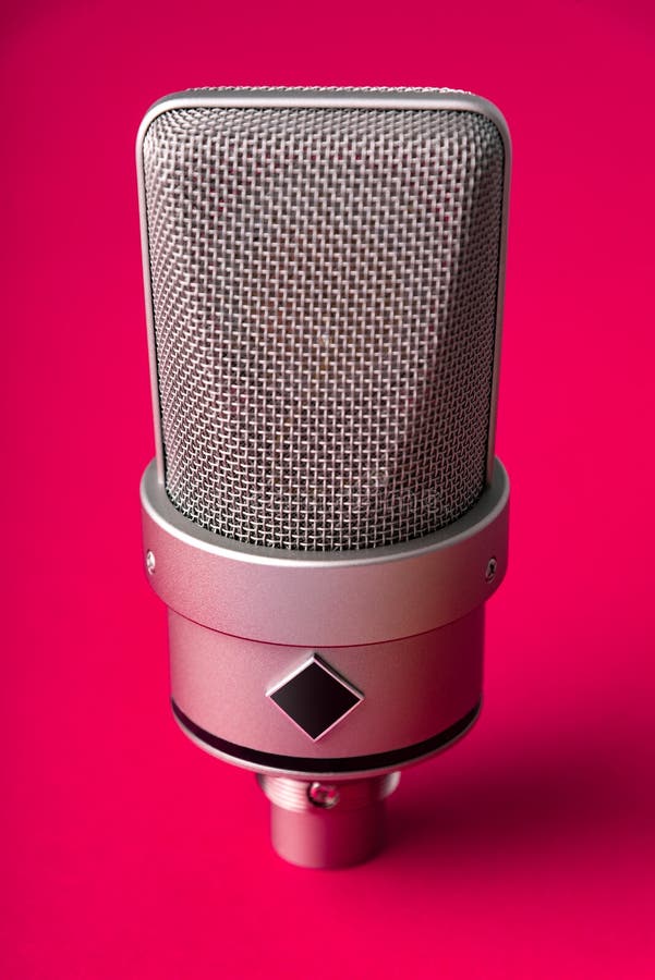 Large Diaphragm Condenser Studio Microphone. on a Red Background. Stock ...