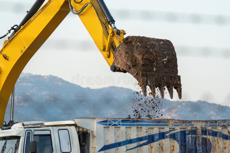 Large Digger Loading a Lorry Stock Image - Image of dumper ...