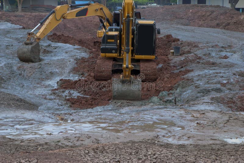 A large digger in Thailand stock image. Image of earth - 91952575
