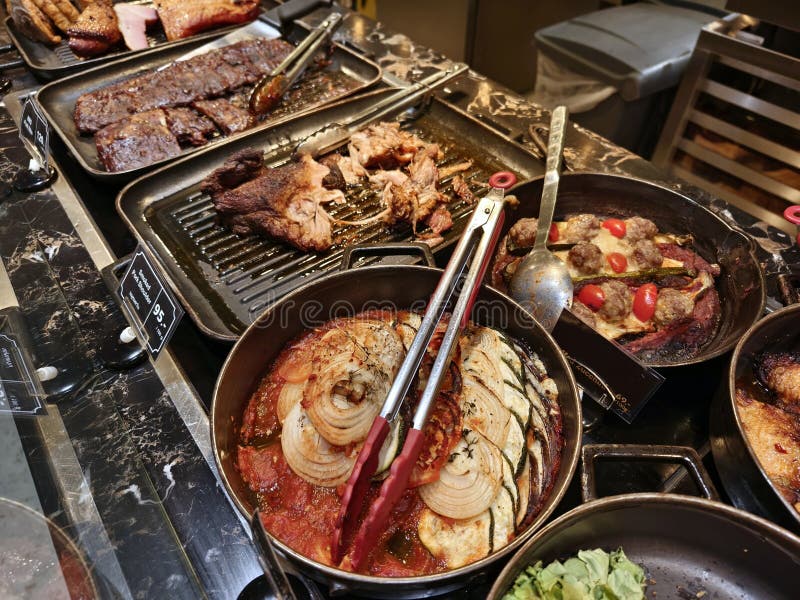 A Large and Diverse Buffet that Includes a Wide Variety of Different ...