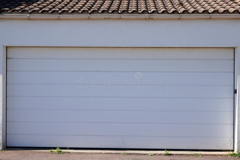 Large Door Sectional Garage Gate White on Home Building Facade Closed ...