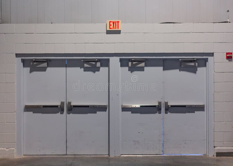 Large Doors with an Exit Red Sign for Emergency Evacuation or ...