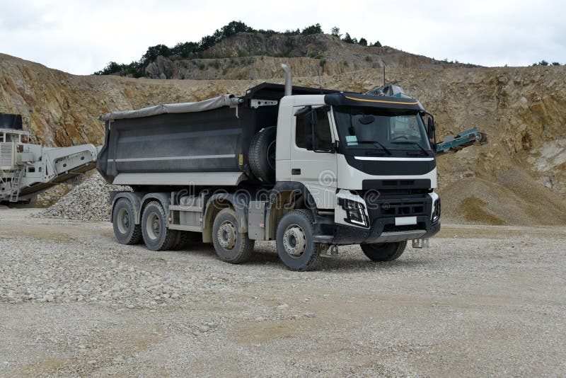 A Large Dump Truck is Parked in a Quarry Stock Image - Image of moving ...