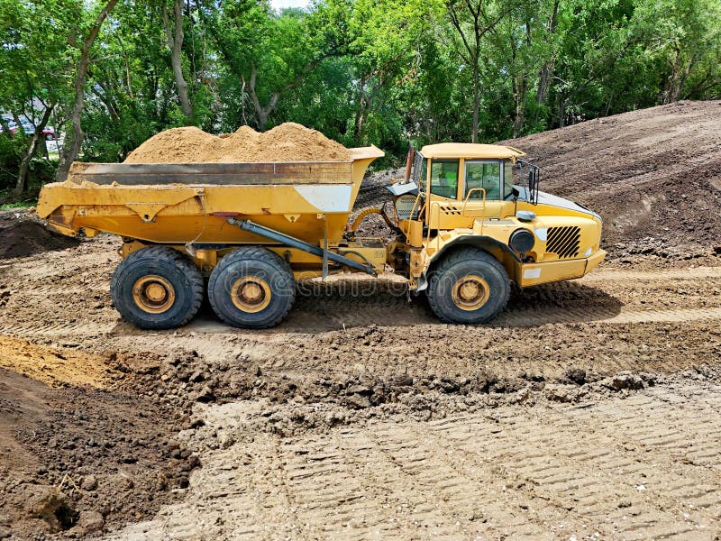 Large Earth Moving Dump Truck Loaded with Sand at a Construction Site ...