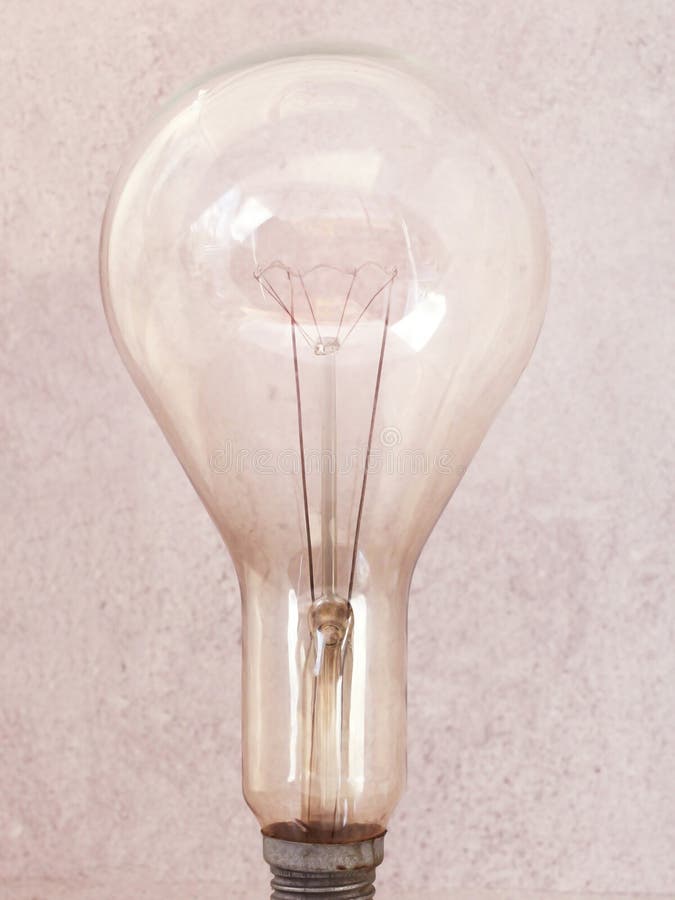 Large Electric Light Bulb on a Gray Background Stock Image - Image of ...