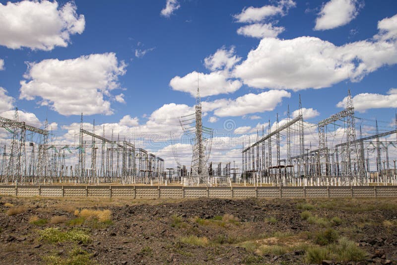 Large Electrical Substation in the Desert Against the Blue Sky Stock ...