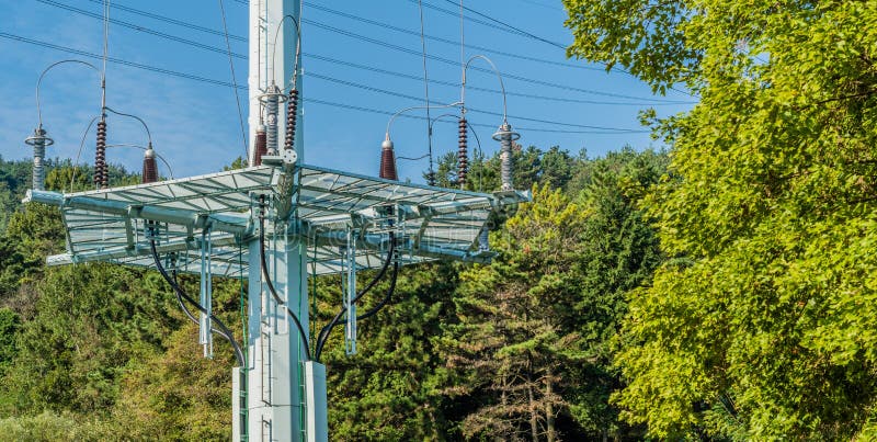 Large Electrical Tower in Densely Wooded Area Stock Image - Image of ...