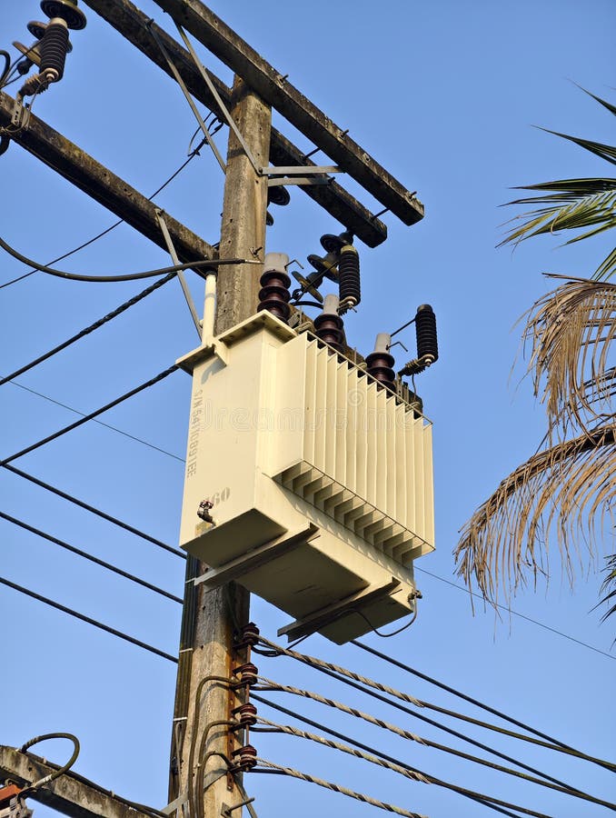 A Large Electrical Transformer on a Utility Pole in a Rural Area Stock ...