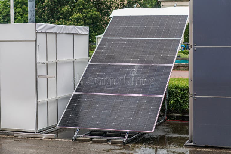 Large, Elevated Solar Panel Array on a Partially Obscured White ...