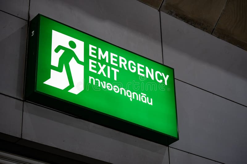 Large Emergency Exit Sign Green Light Box is Placed on the Wall of ...