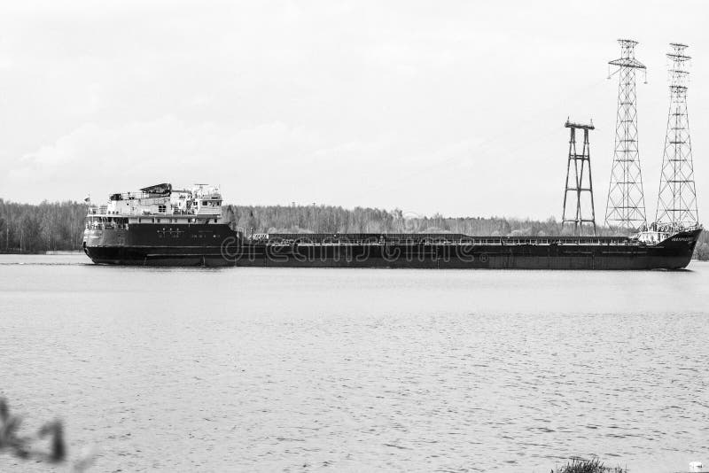 .a Large Empty Barge Floats on the River. Side View Stock Photo - Image ...