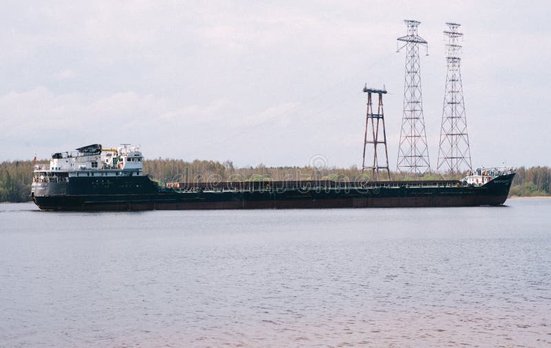 .a Large Empty Barge Floats on the River. Side View Stock Photo - Image ...