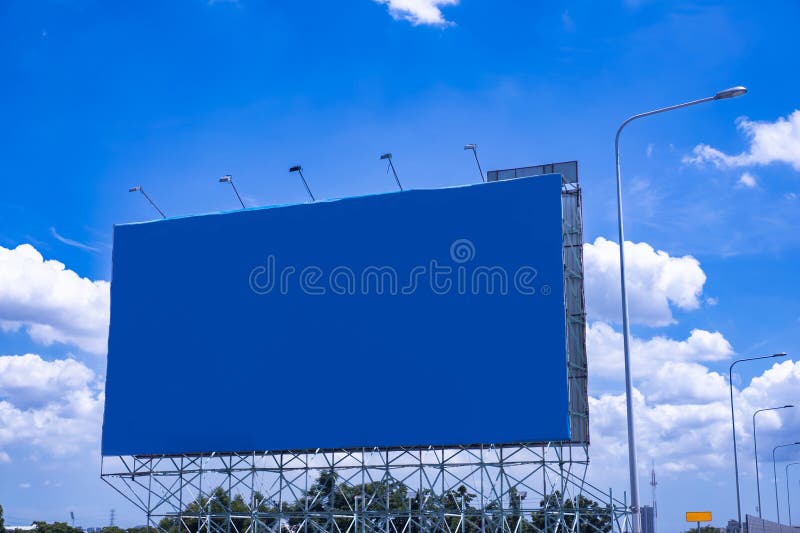 Large Empty Blue Billboard on Morning Sky Background Stock Image ...