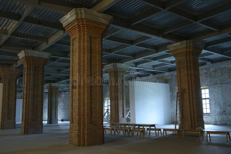 Large Empty Hall Under Construction. Brick Pillar Columns, Ladder ...