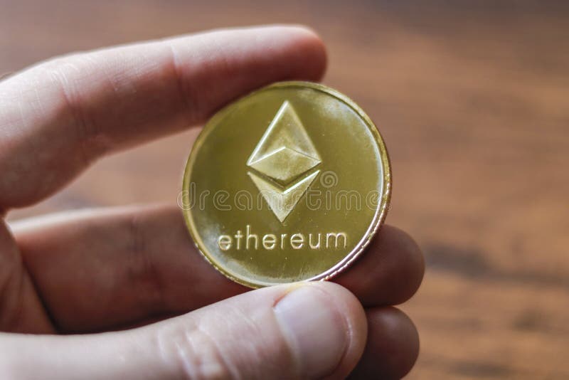A Large Etherium Token in Hand Editorial Stock Photo - Image of ...
